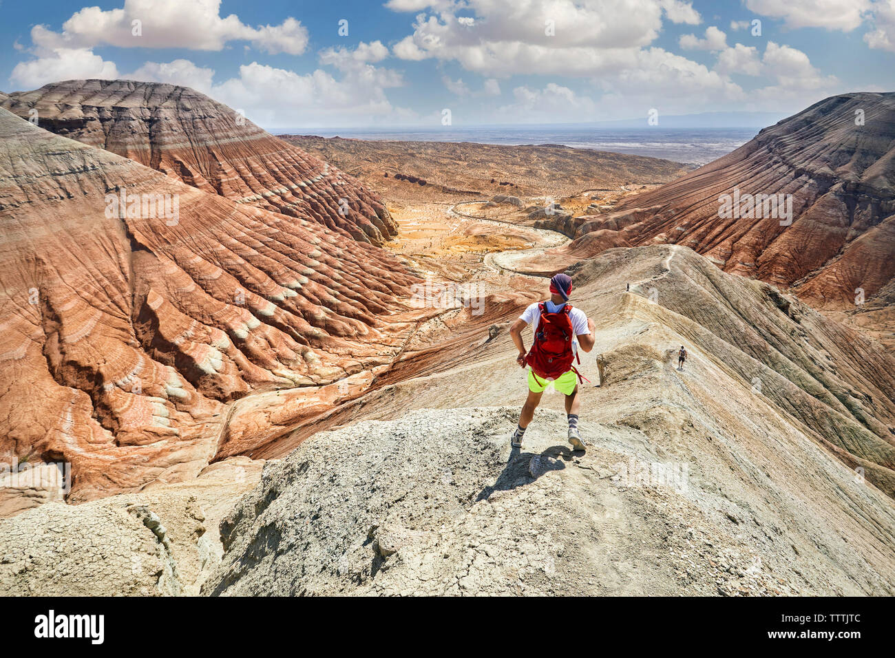 Man running backpack trail hi-res stock photography and images - Alamy