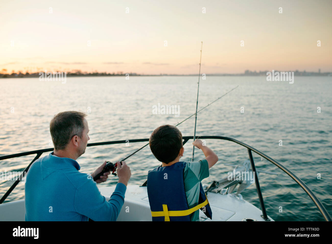 Family boat fishing hi-res stock photography and images - Alamy