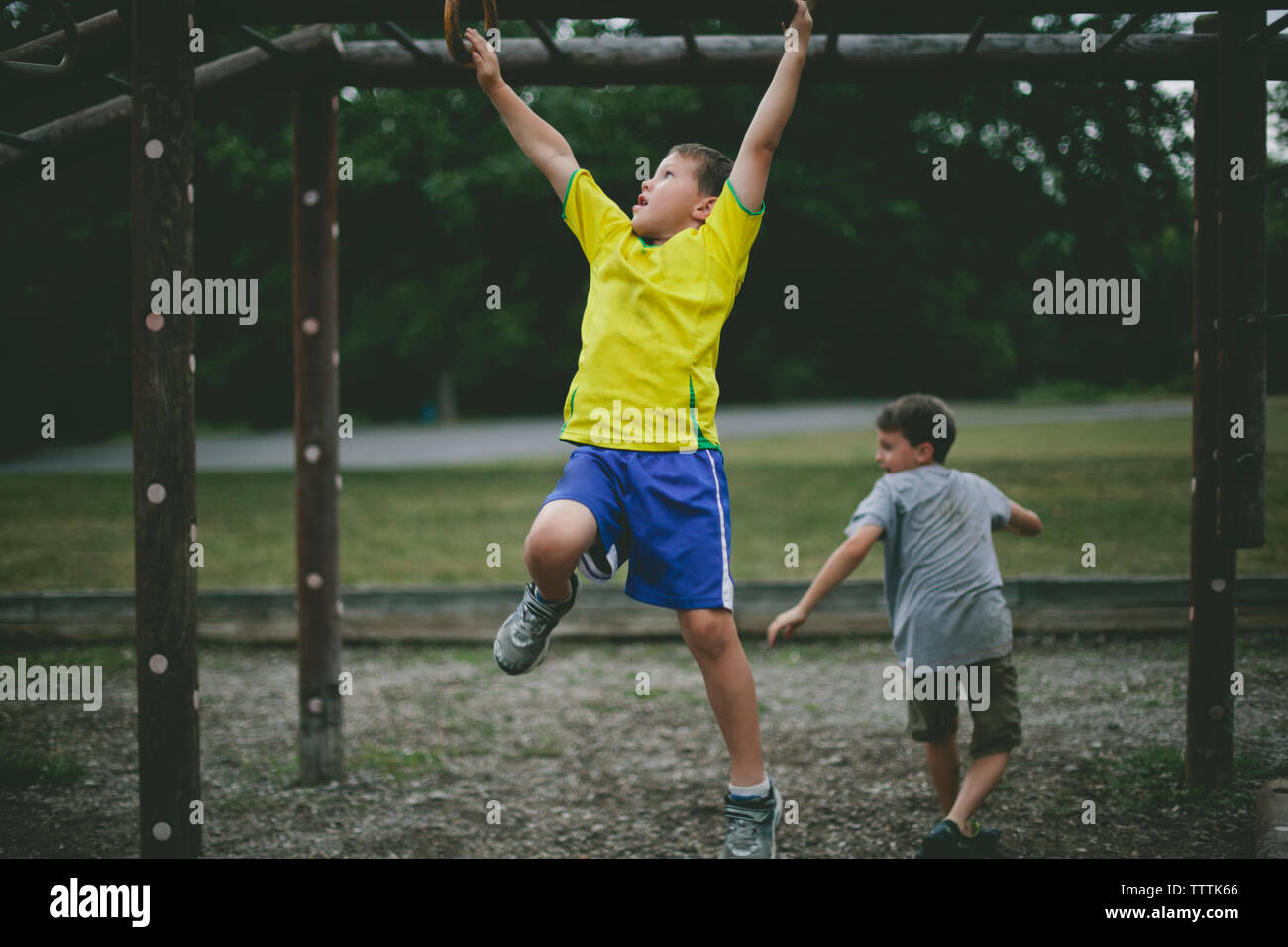Boys running in field hi-res stock photography and images - Alamy