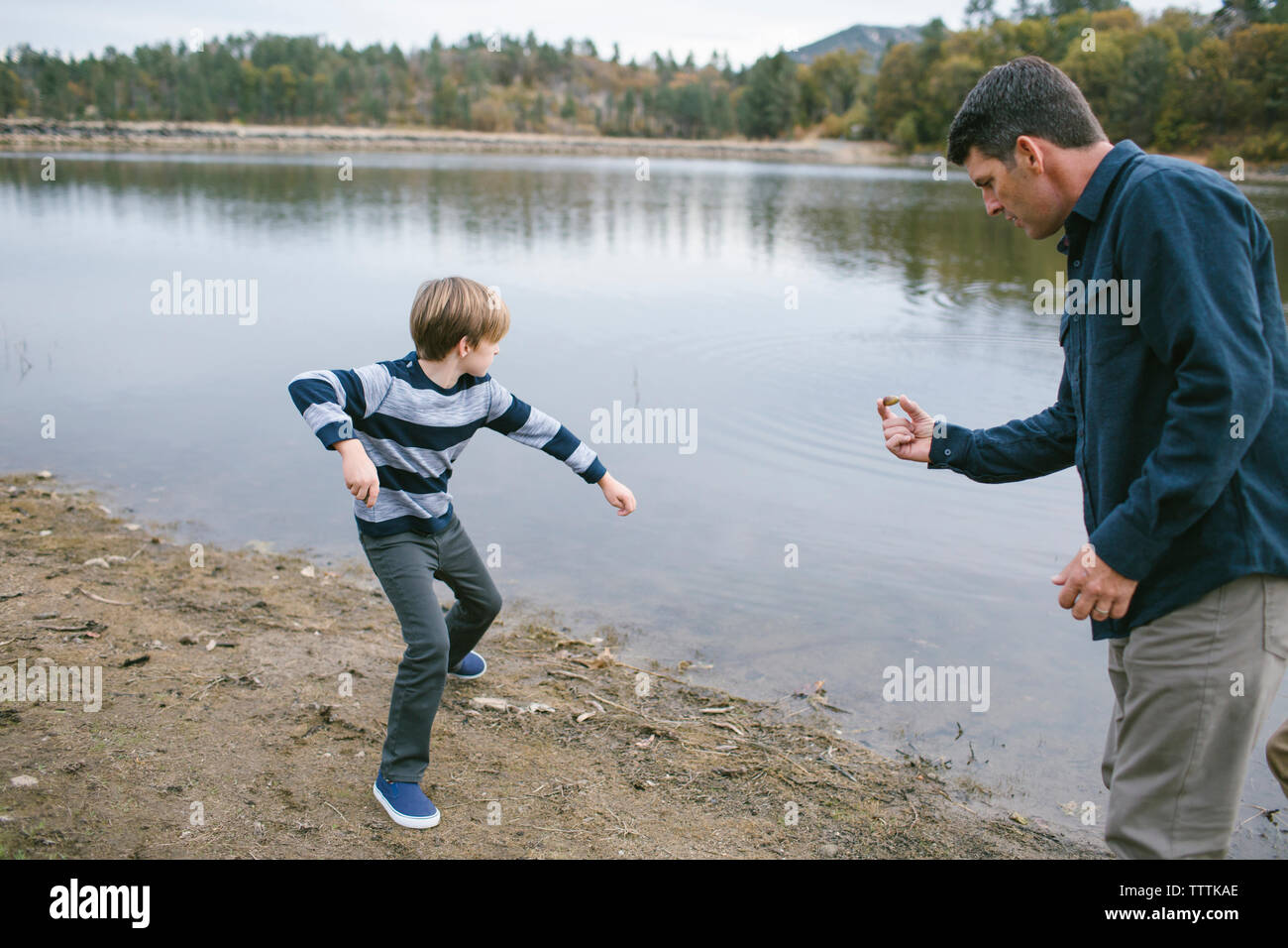 Throwing pebbles hi-res stock photography and images - Alamy
