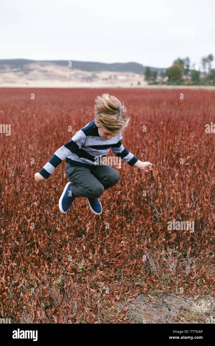 Boy 8 jumping hi-res stock photography and images - Alamy