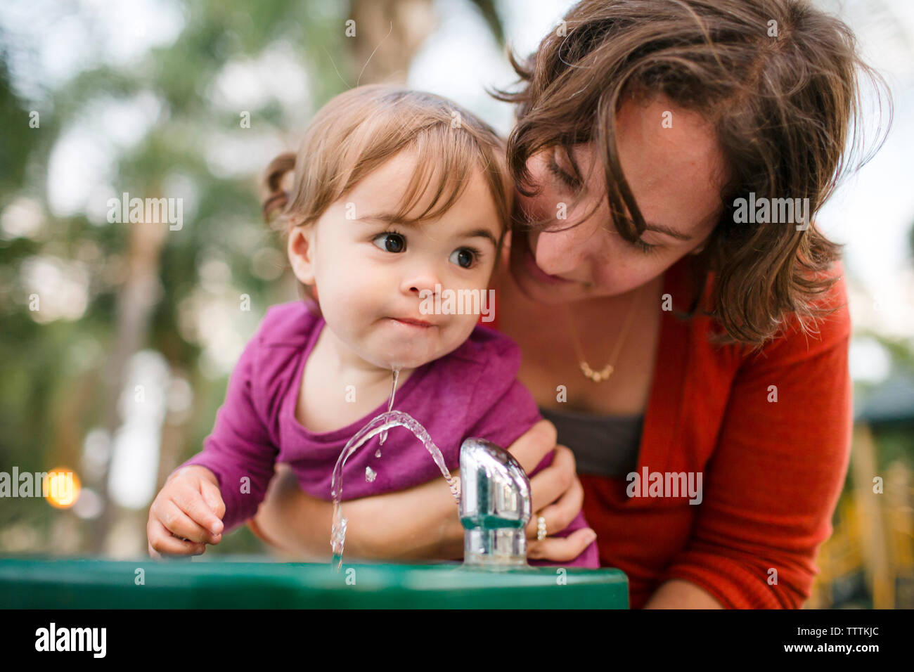 Woman drink drinking fountain hi-res stock photography and images - Alamy