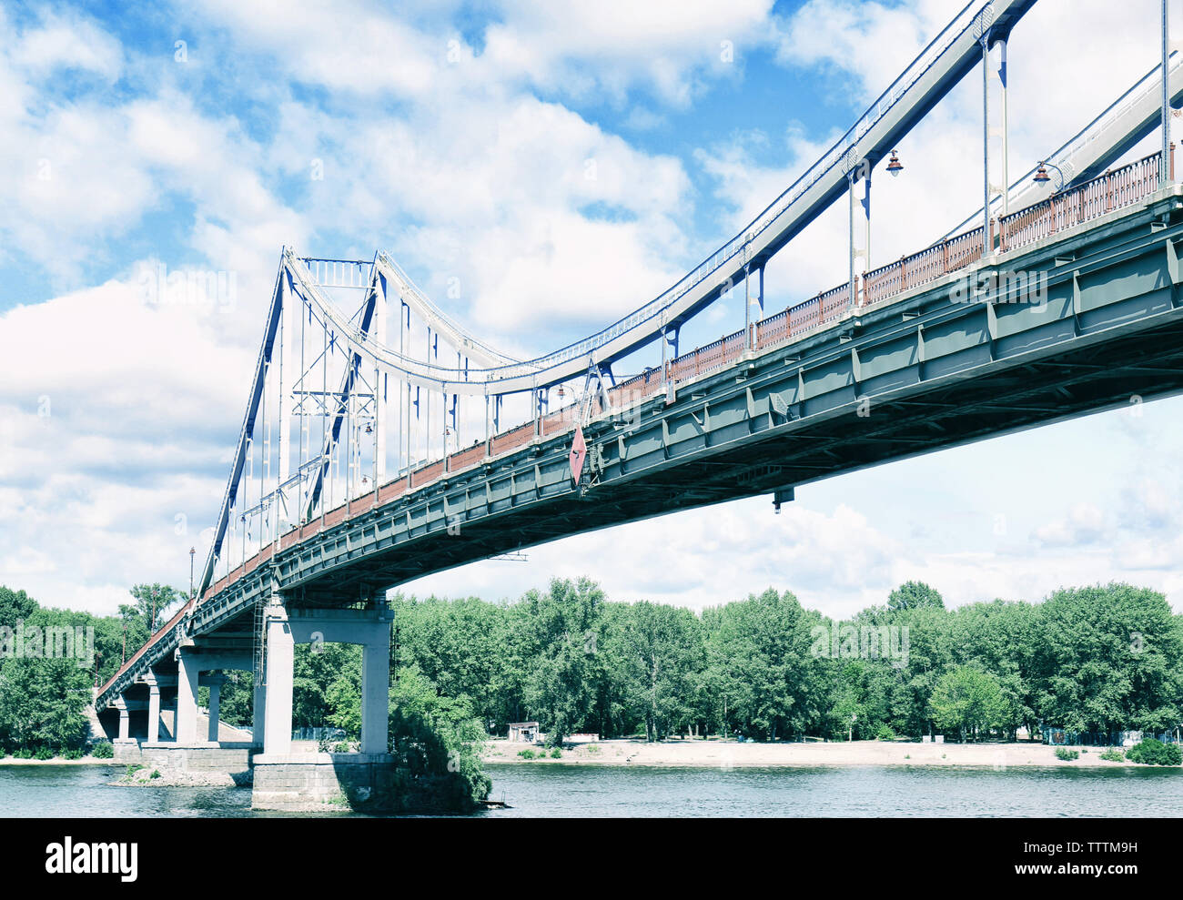 Steel bridge over river Stock Photo - Alamy