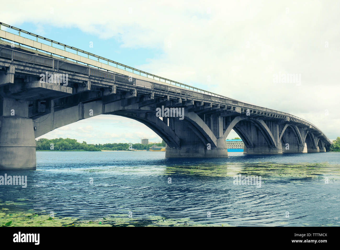 Concrete bridge over river Stock Photo - Alamy