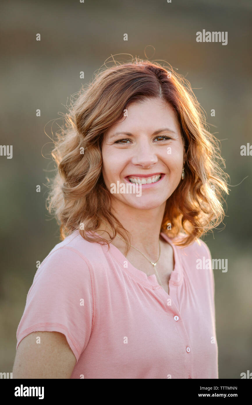 Woman smiling portrait hi-res stock photography and images - Alamy