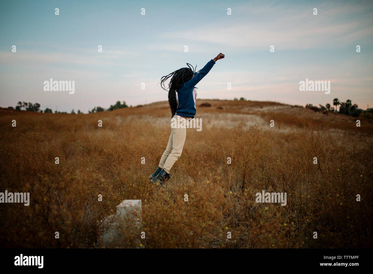 Girl 7 jumping hi-res stock photography and images - Alamy