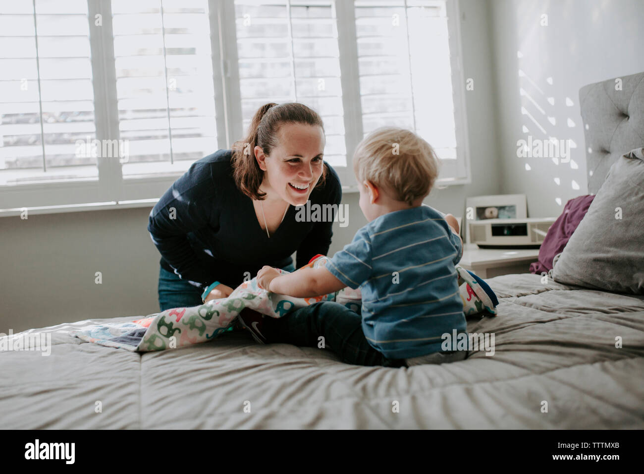 Woman son talking home hi-res stock photography and images - Alamy