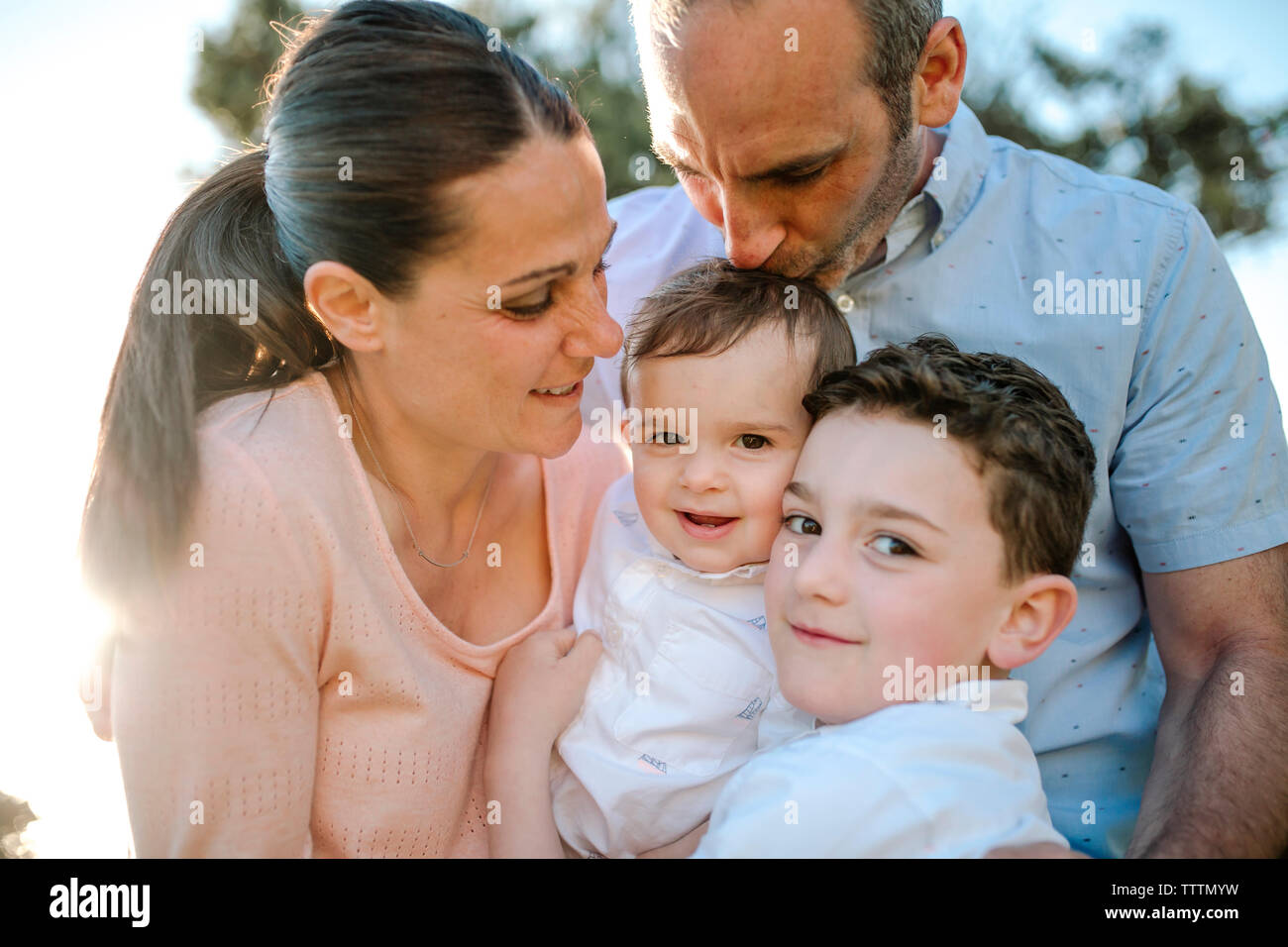 Family standing outdoors hi-res stock photography and images - Alamy