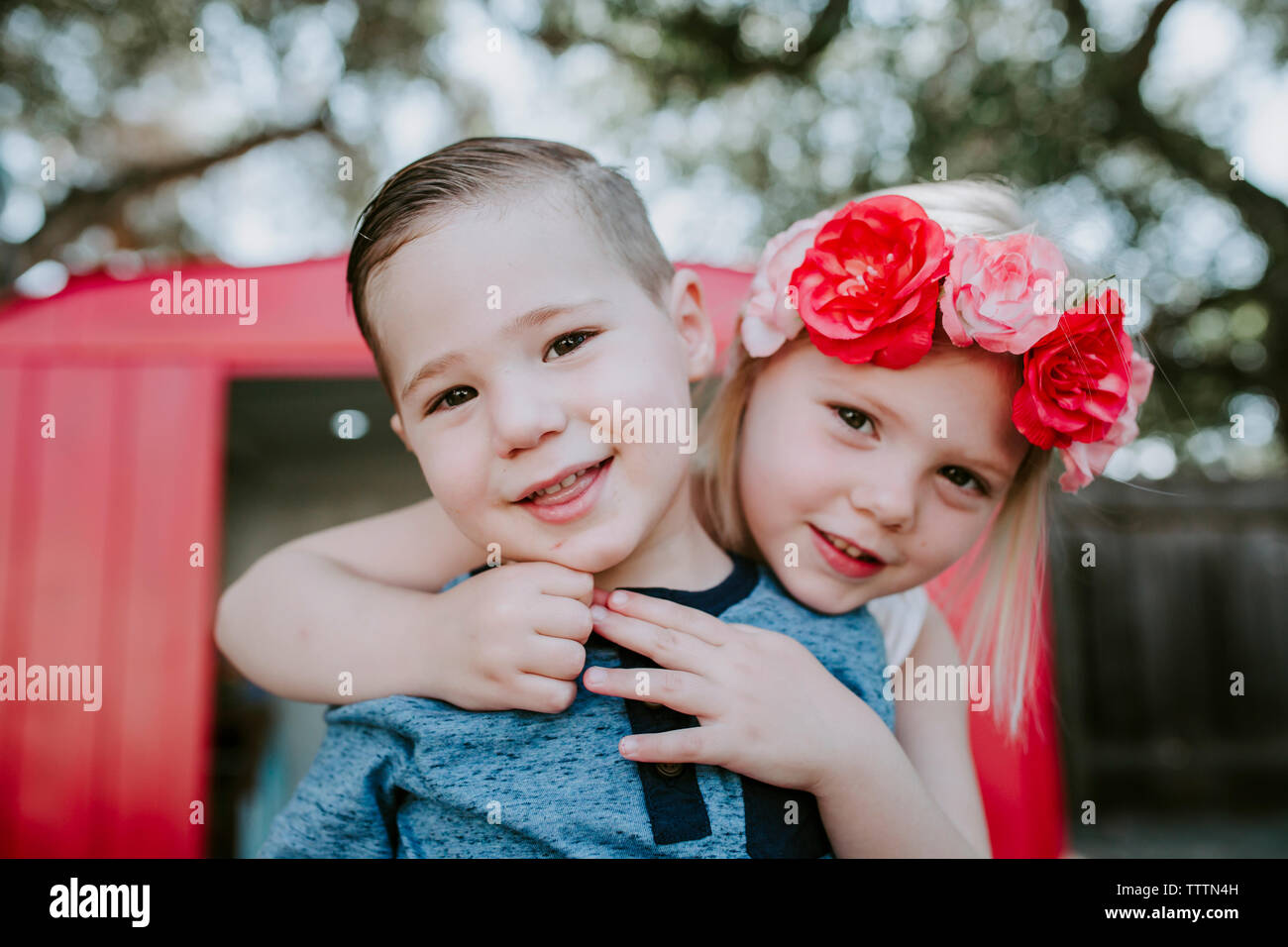 Cute siblings arms around hi-res stock photography and images - Alamy