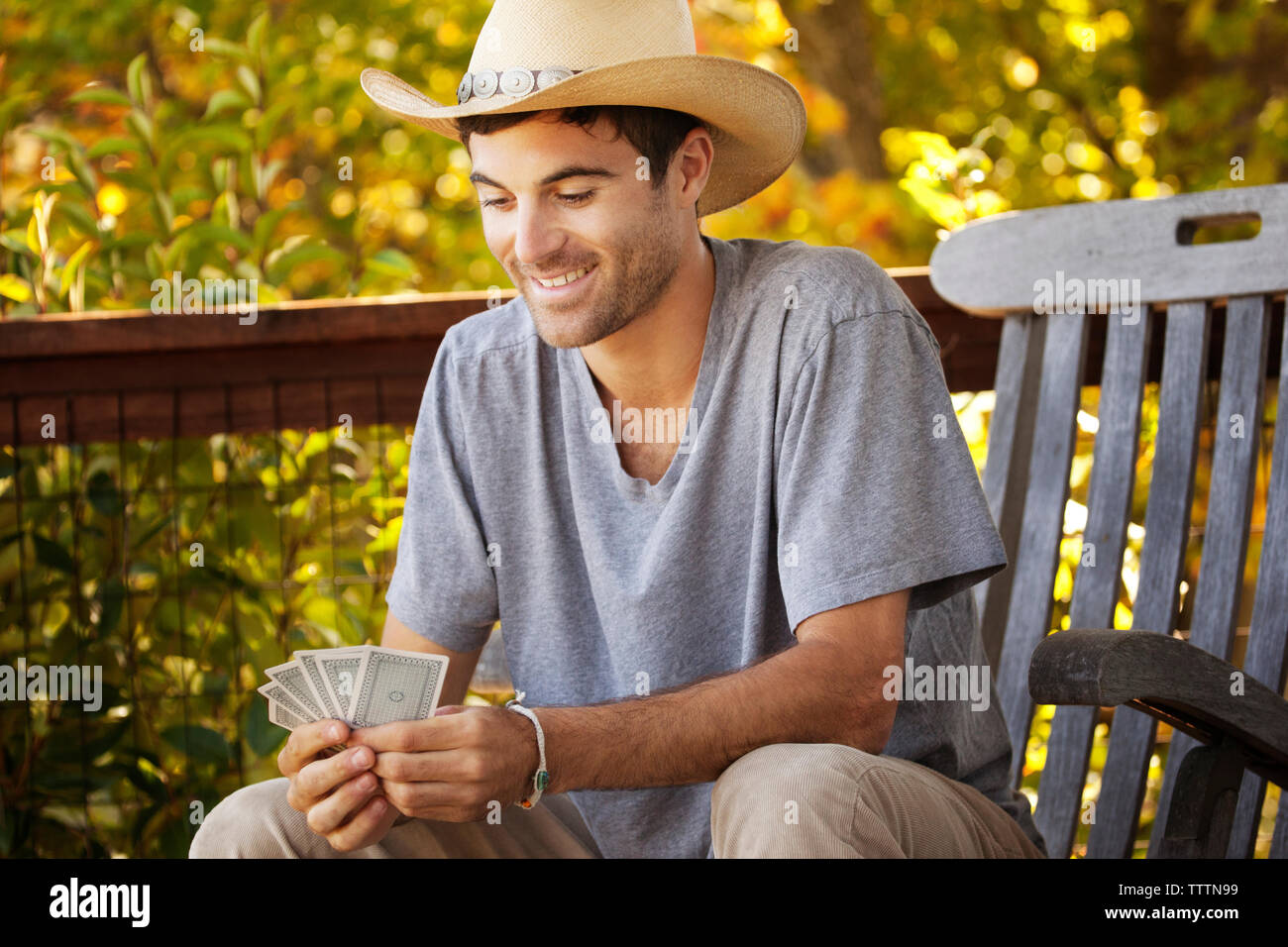 Man sitting on rocking chair hi-res stock photography and images - Alamy