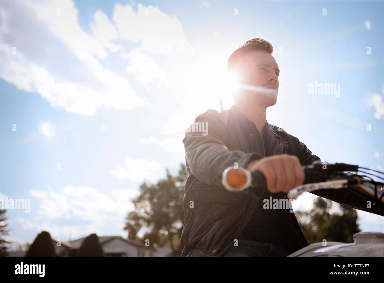 Biker riding motorcycle low angle hi-res stock photography and images ...