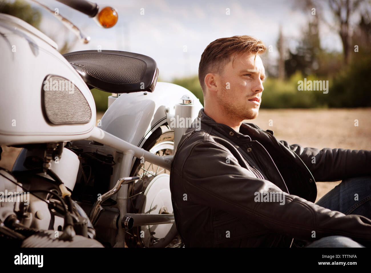 Man black hair motorcycle hi-res stock photography and images - Alamy