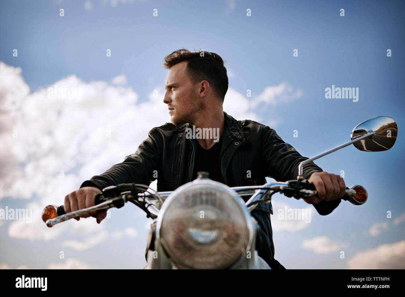 Biker riding motorcycle low angle hi-res stock photography and images ...