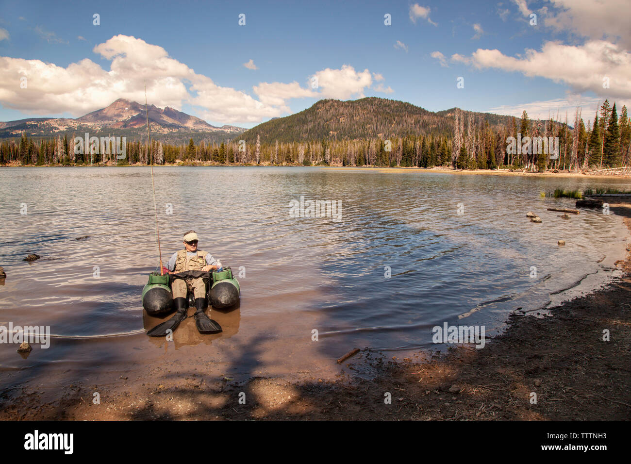 Man in raft hi-res stock photography and images - Alamy