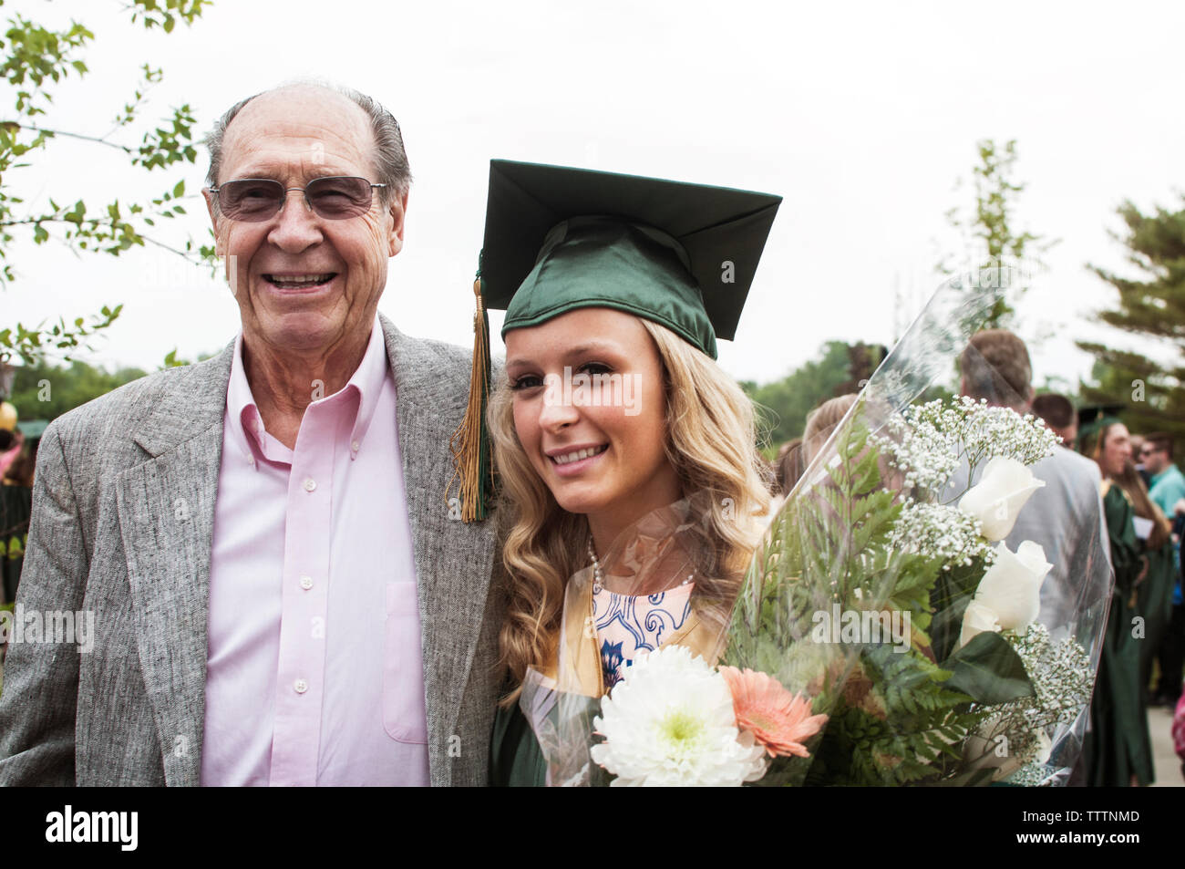 Young woman with father at graduation ceremony Stock Photo - Alamy
