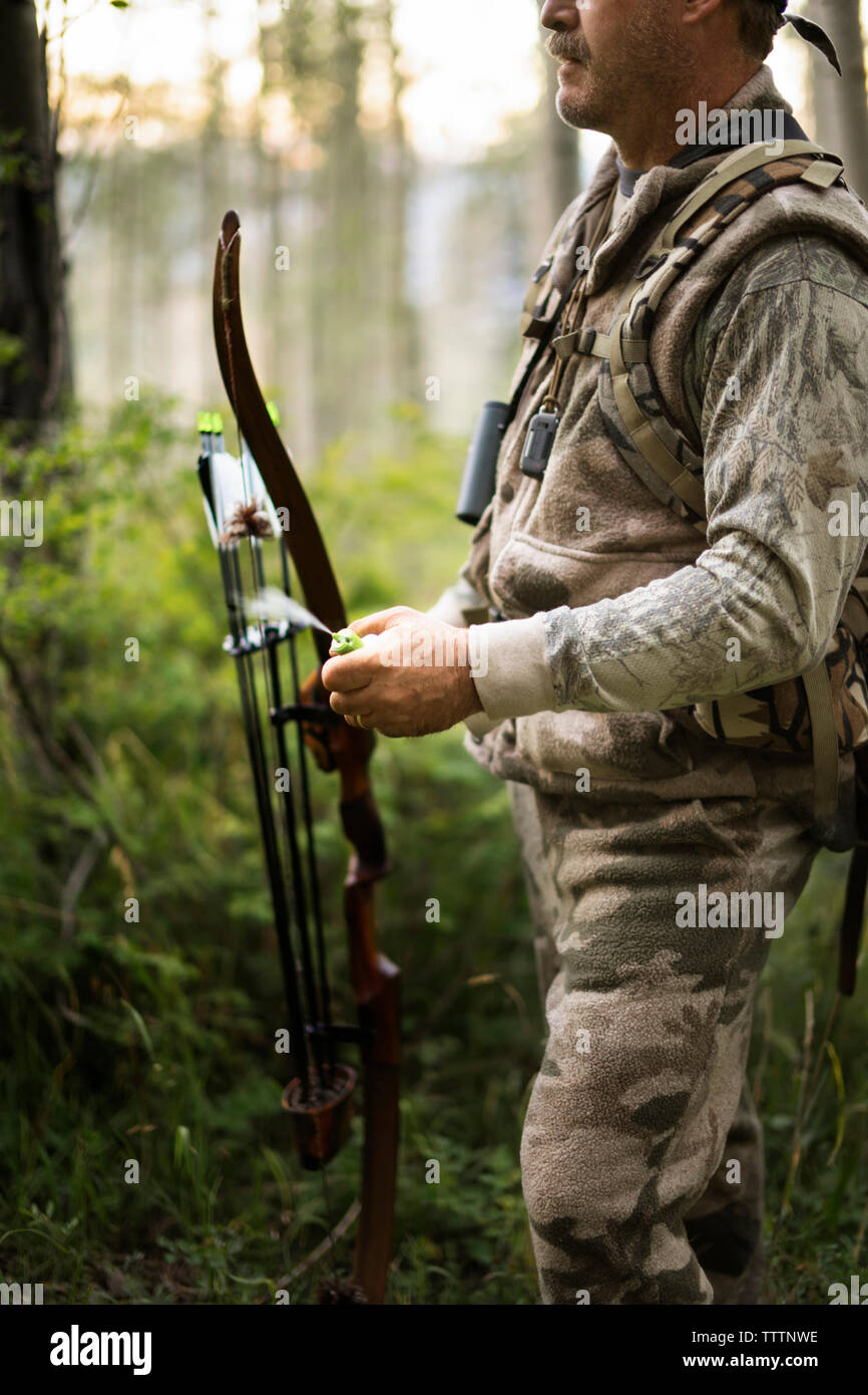 Hunter standing in forest hi-res stock photography and images - Alamy