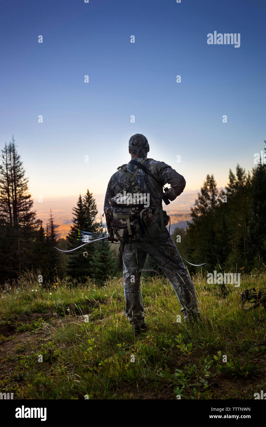 Hunter Standing In Forest High Resolution Stock Photography and Images ...