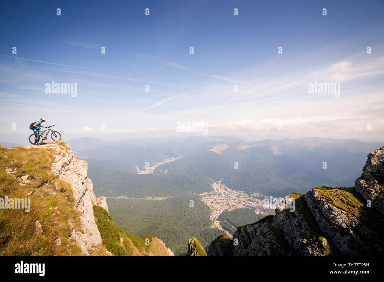 Cyclist standing side on hi-res stock photography and images - Alamy