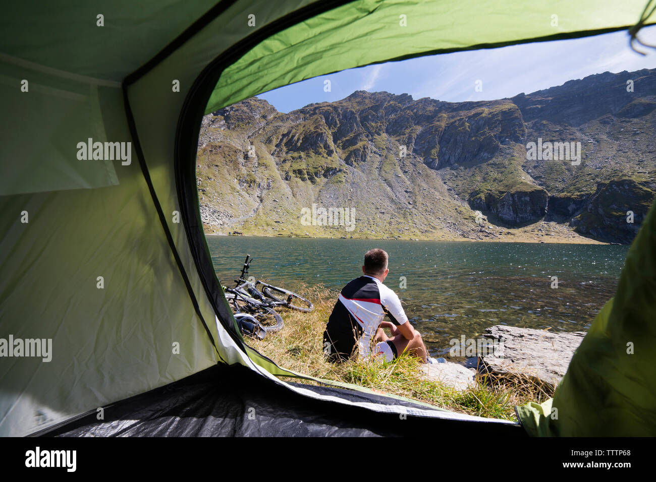 Male athlete sitting tent hi-res stock photography and images - Alamy
