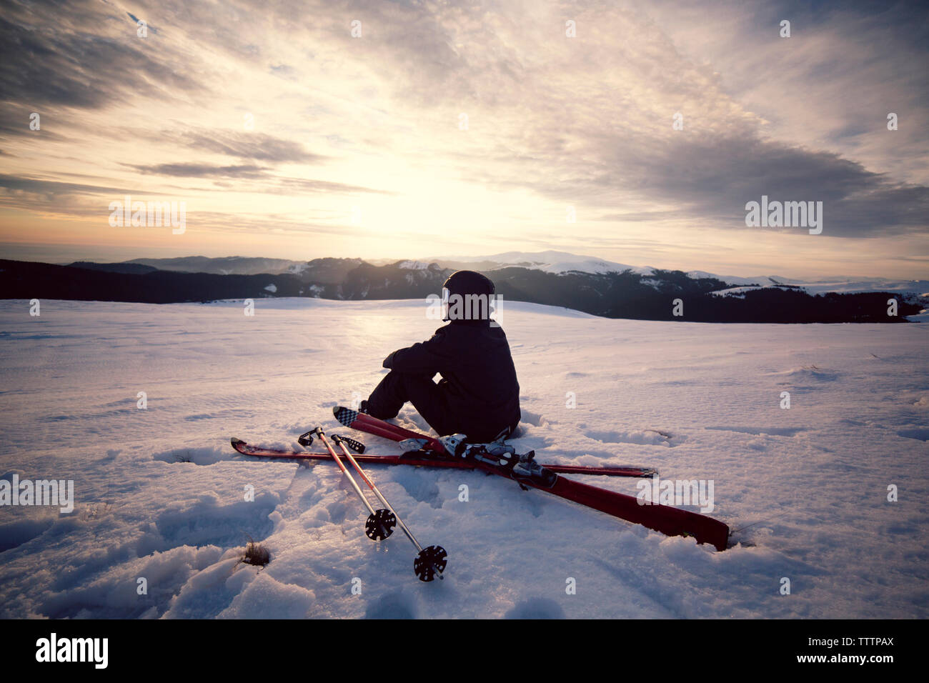 Skier sitting on snow hi-res stock photography and images - Alamy