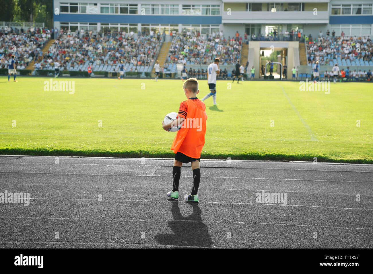 Football match in sunny summer day Stock Photo - Alamy