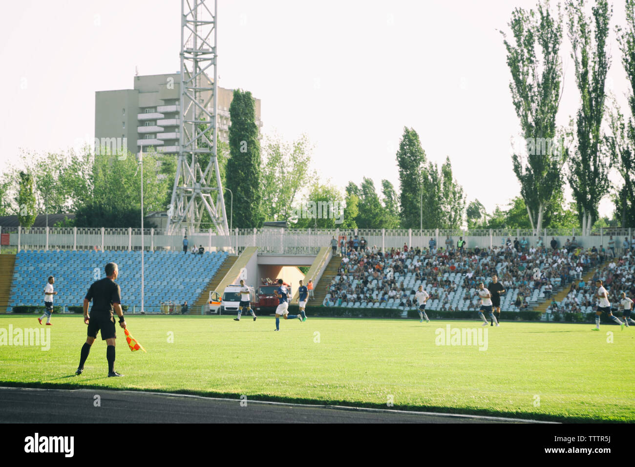 Football match in sunny hi-res stock photography and images - Alamy