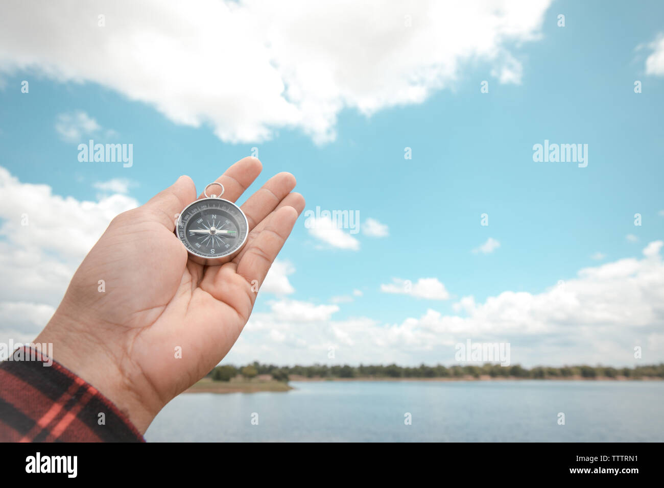 Business man holding compass hi-res stock photography and images - Alamy