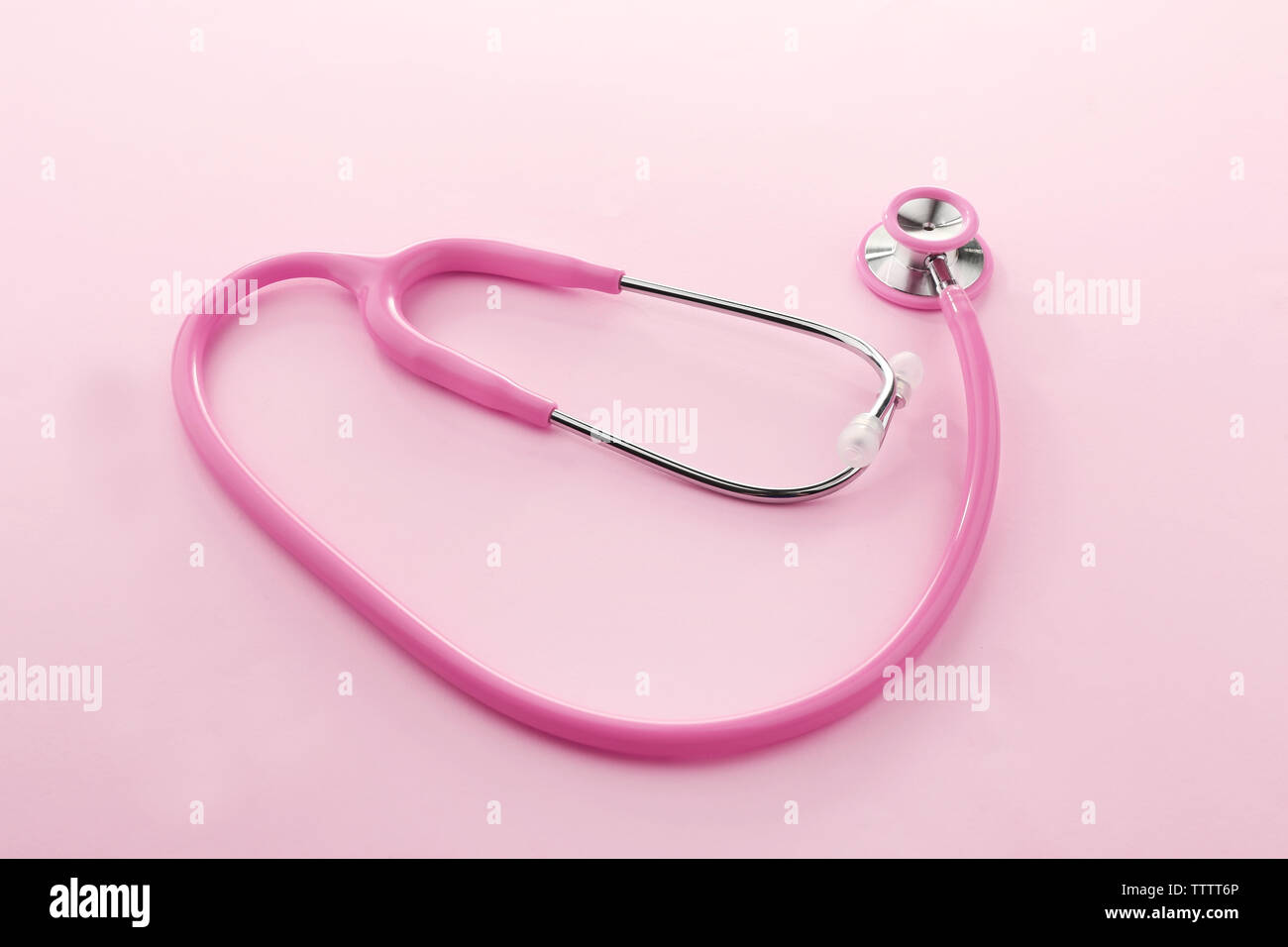 Pink stethoscope on pink background Stock Photo - Alamy