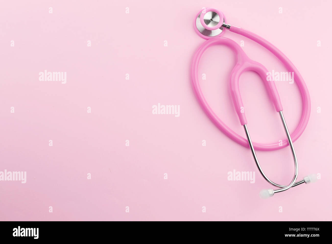 Pink stethoscope on pink background Stock Photo - Alamy