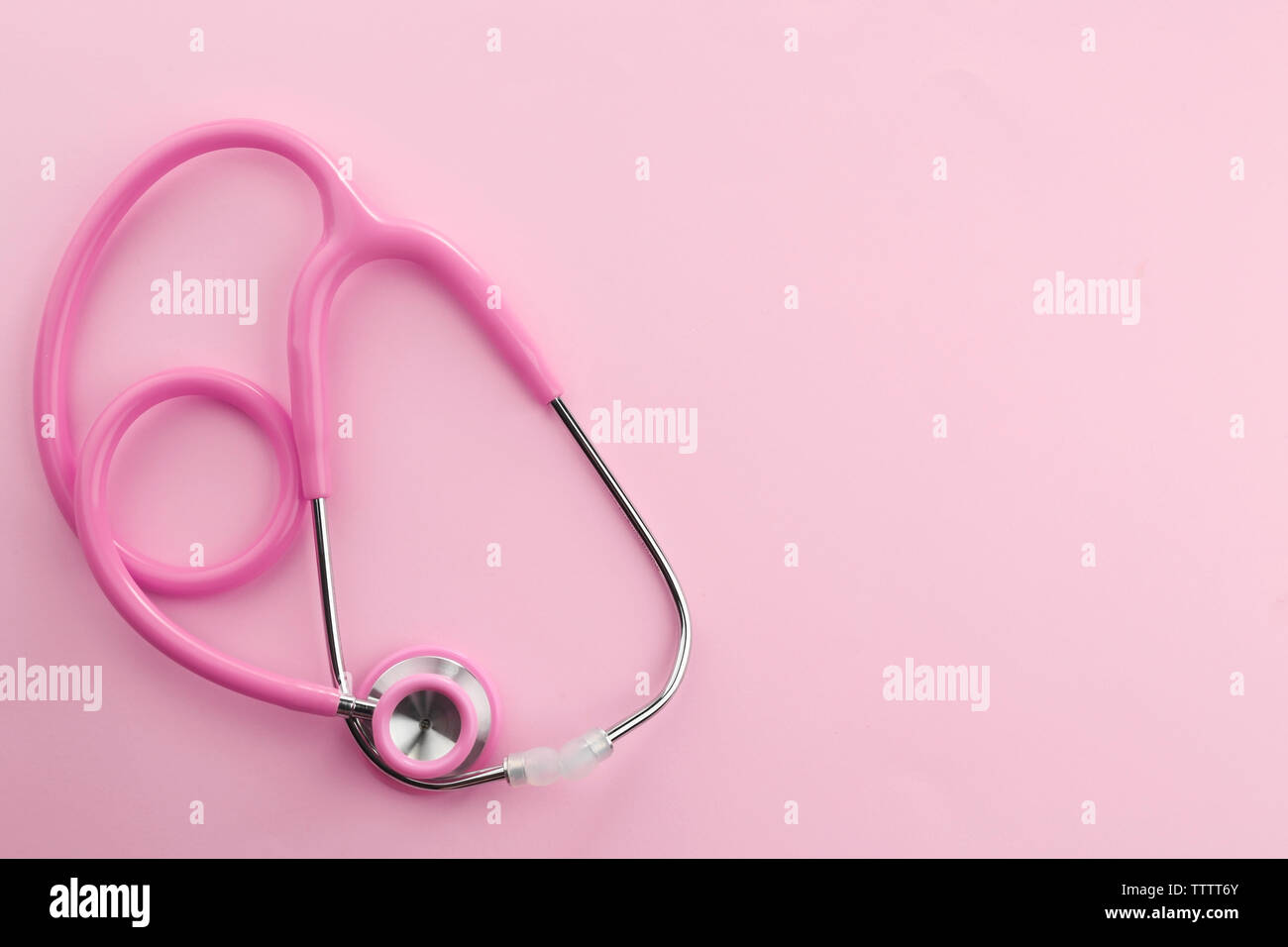 Pink stethoscope on pink background Stock Photo - Alamy
