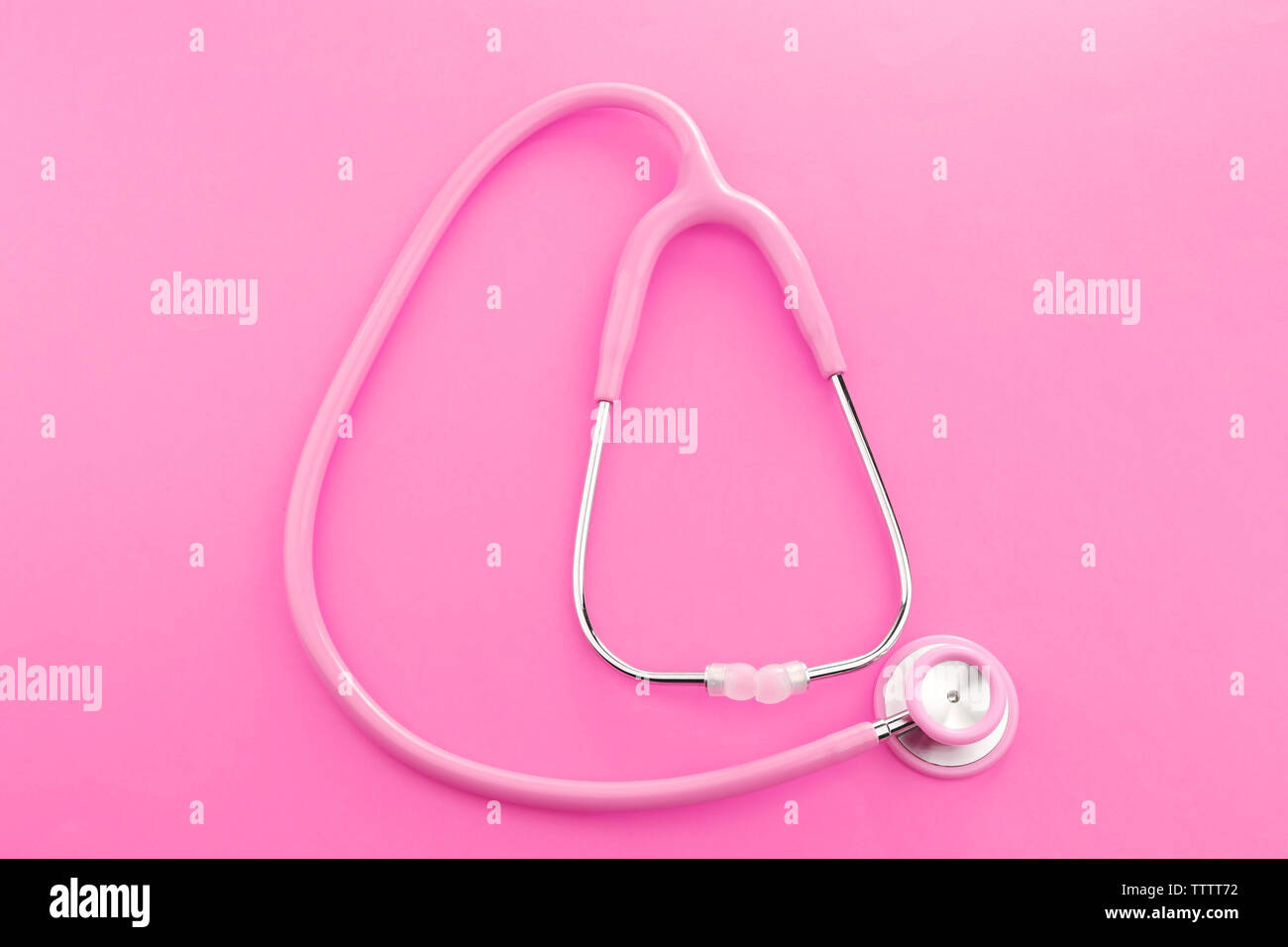 Pink stethoscope on pink background Stock Photo - Alamy