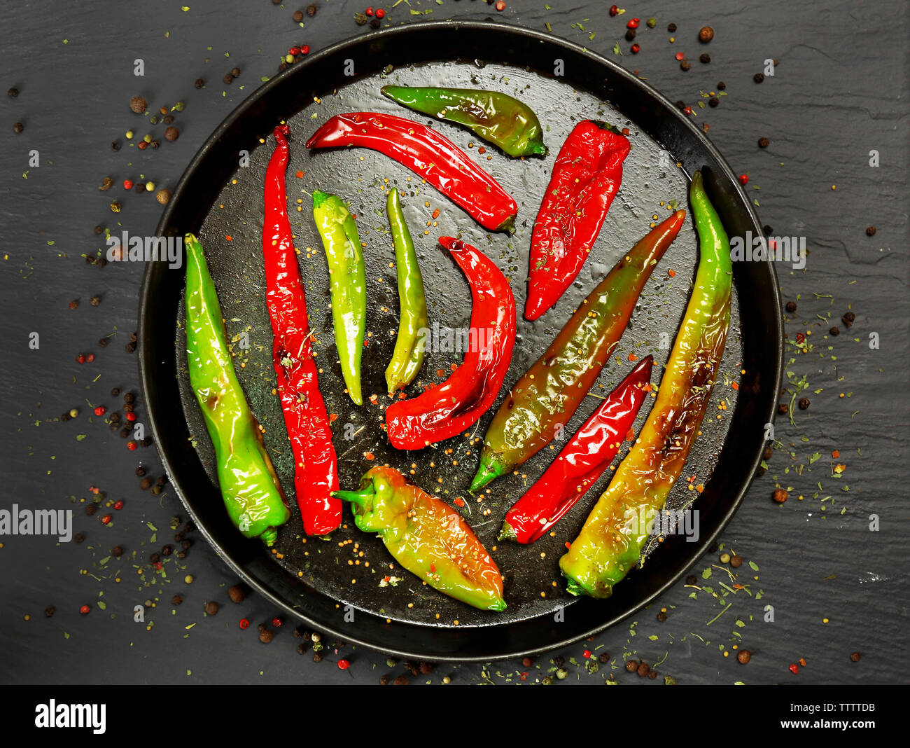 Grilled pepper on metal tray, top view Stock Photo - Alamy
