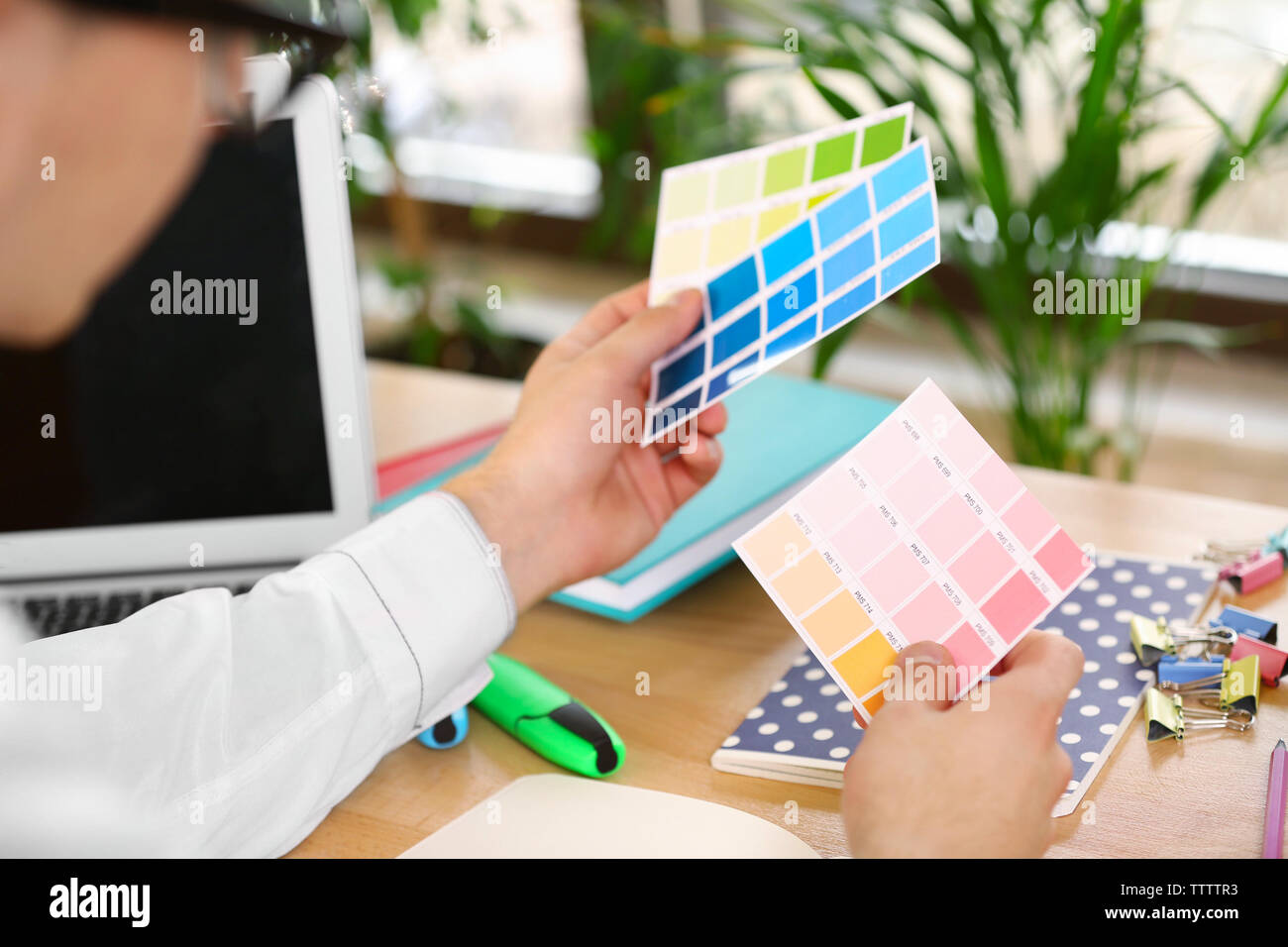 Man holding colour palette in office, close up Stock Photo - Alamy