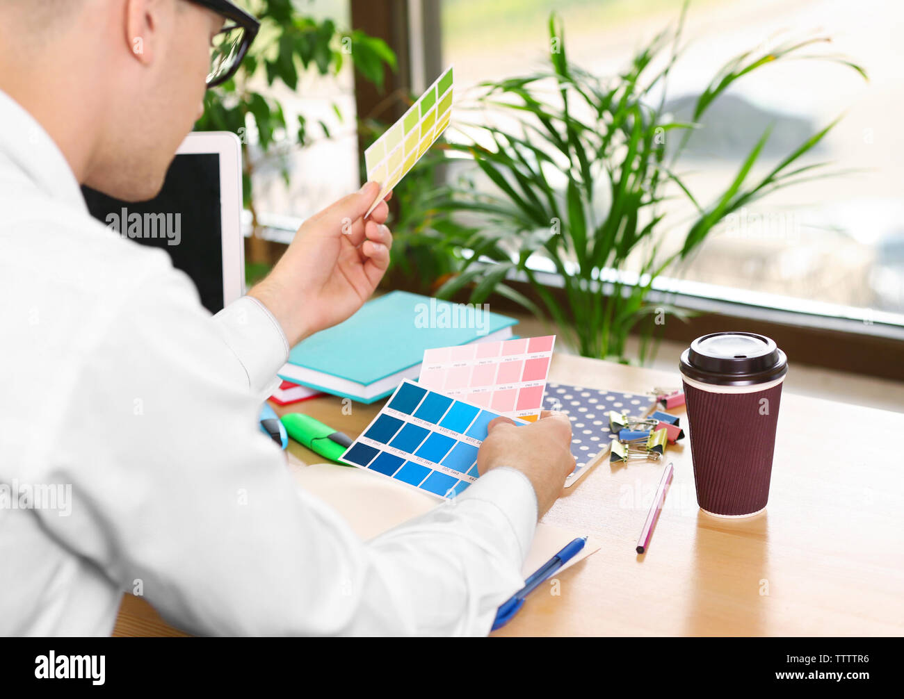 Person in office desk colourful hi-res stock photography and images - Alamy