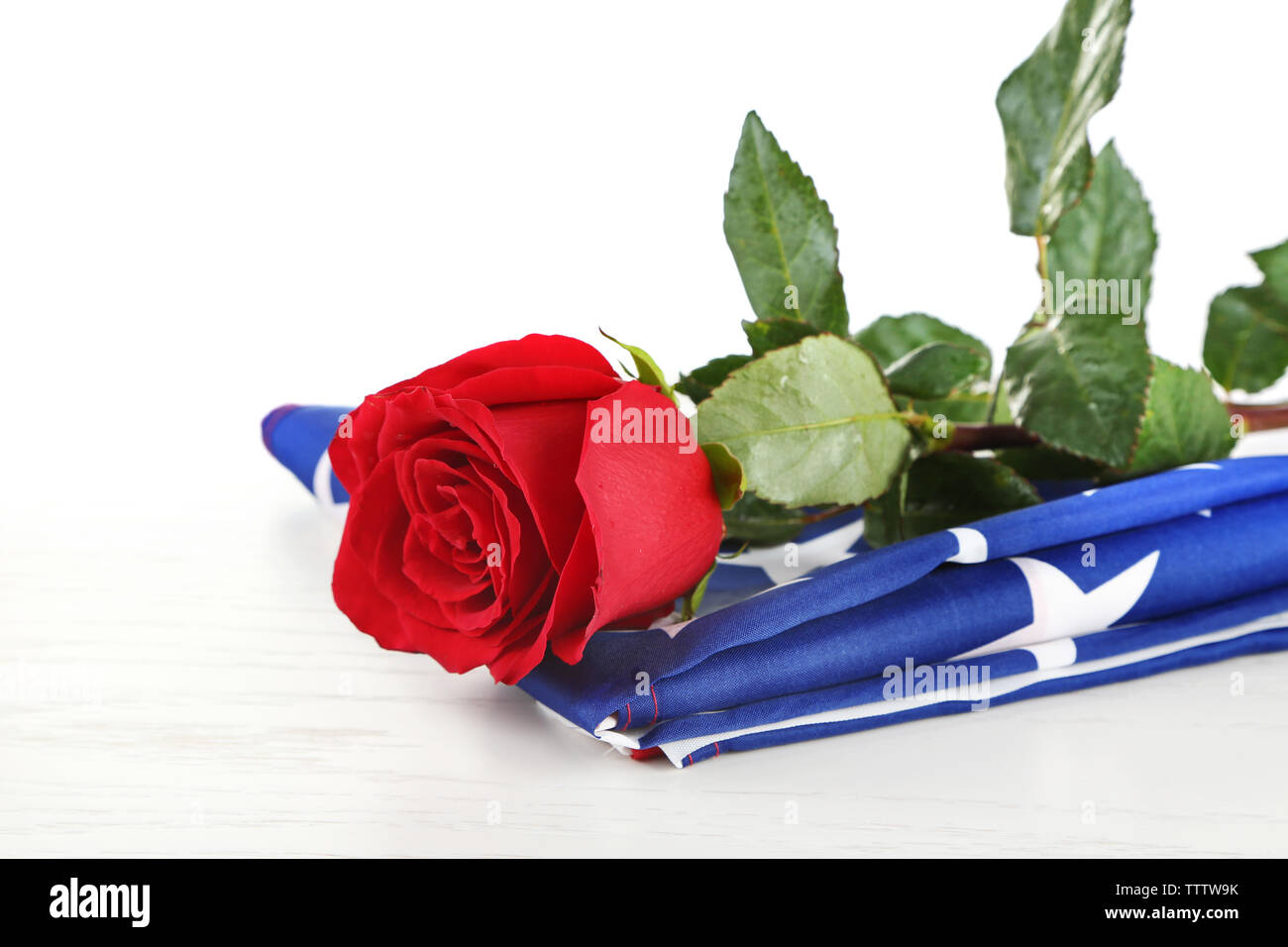 Blue flag with white rose hi-res stock photography and images - Alamy