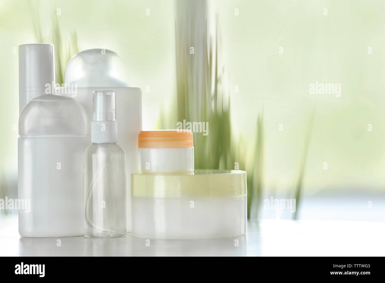 Cosmetics set on light background Stock Photo - Alamy