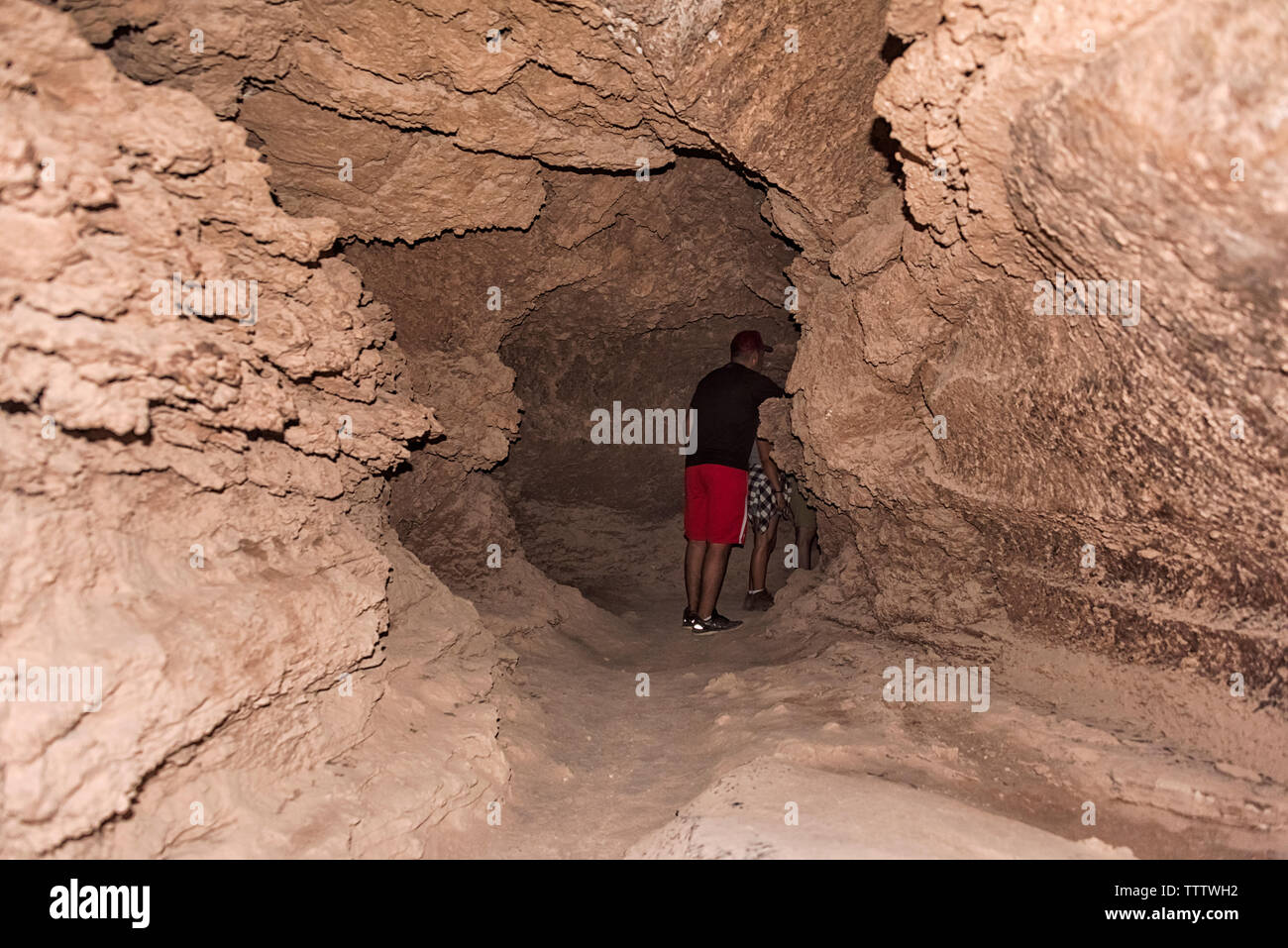 Tourist In The Salt Caves Valle De La Luna Moon Valley San Pedro De Tourist In The Salt Caves Valle De La Luna Moon Valley San Pedro De