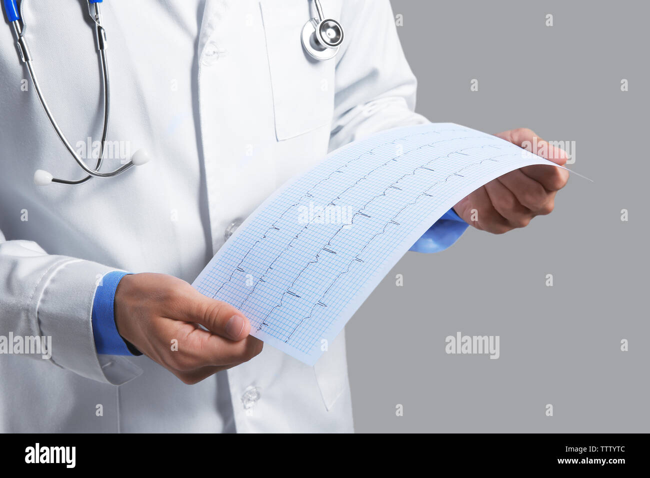 Male doctor cardiogram paper hi-res stock photography and images - Alamy