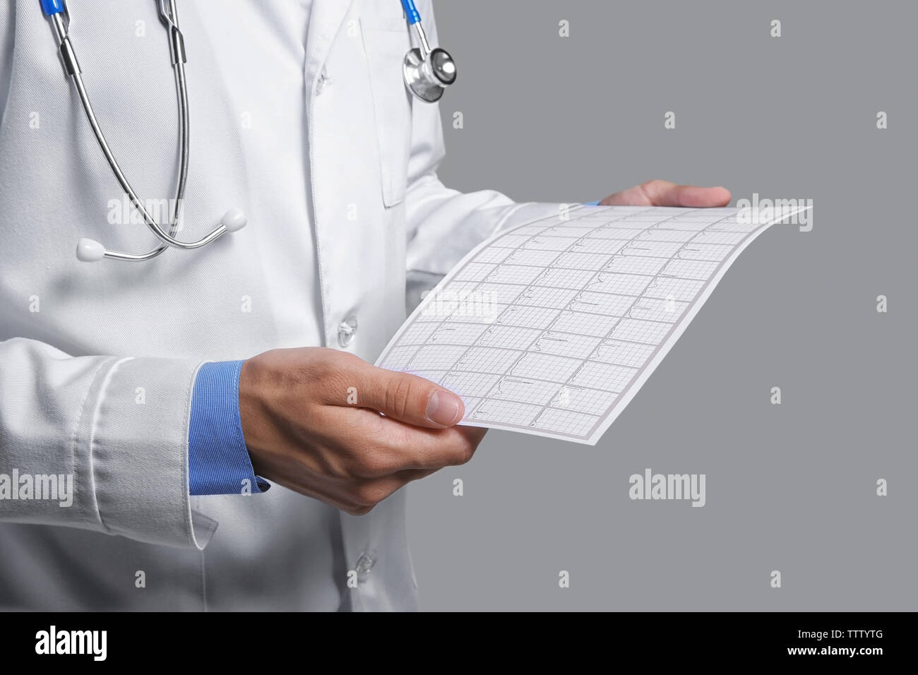 Male doctor cardiogram paper hi-res stock photography and images - Alamy