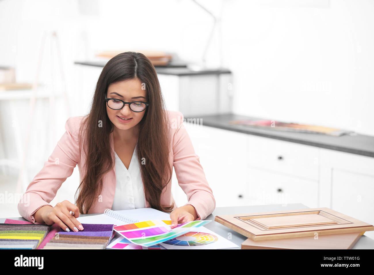 Beautiful female designer working hi-res stock photography and images ...