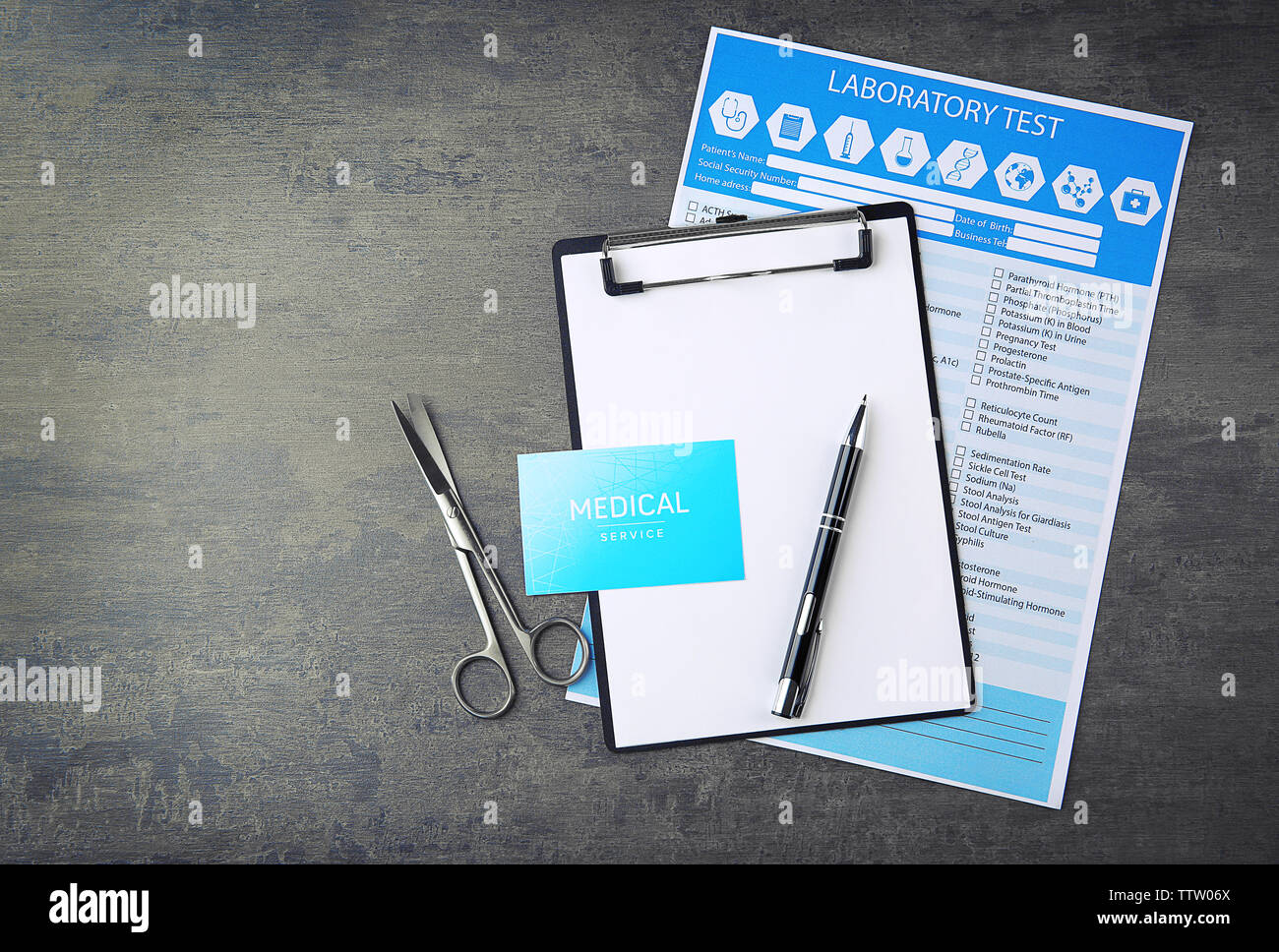 Medical concept. Clipboard, business card with laboratory tests form ...