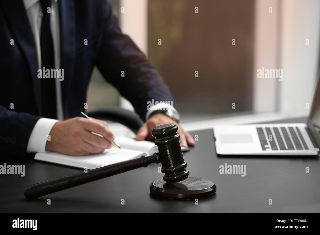 Lawyer judge gavel laptop pen hi-res stock photography and images - Alamy