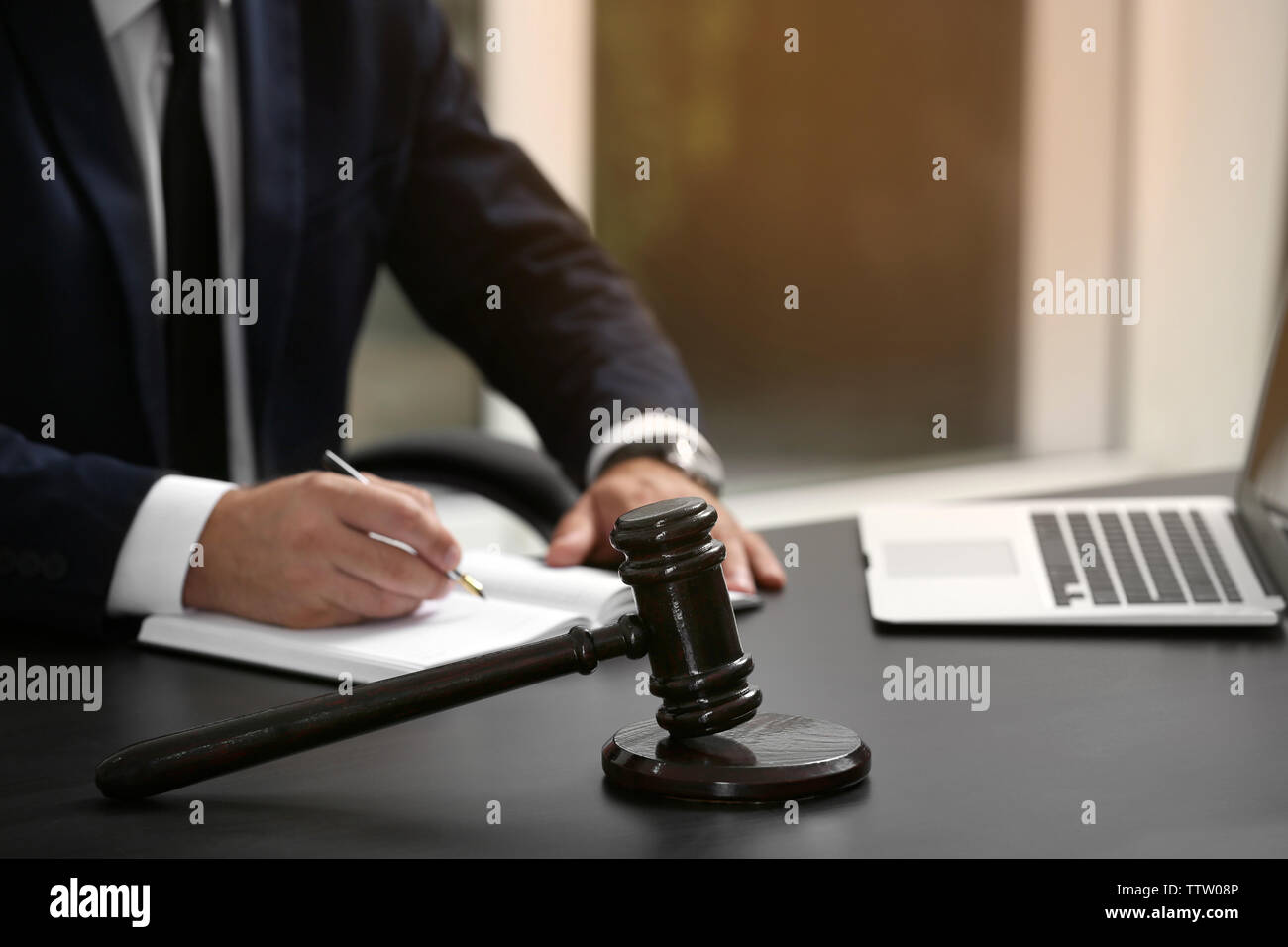 Lawyer judge gavel laptop pen hi-res stock photography and images - Alamy