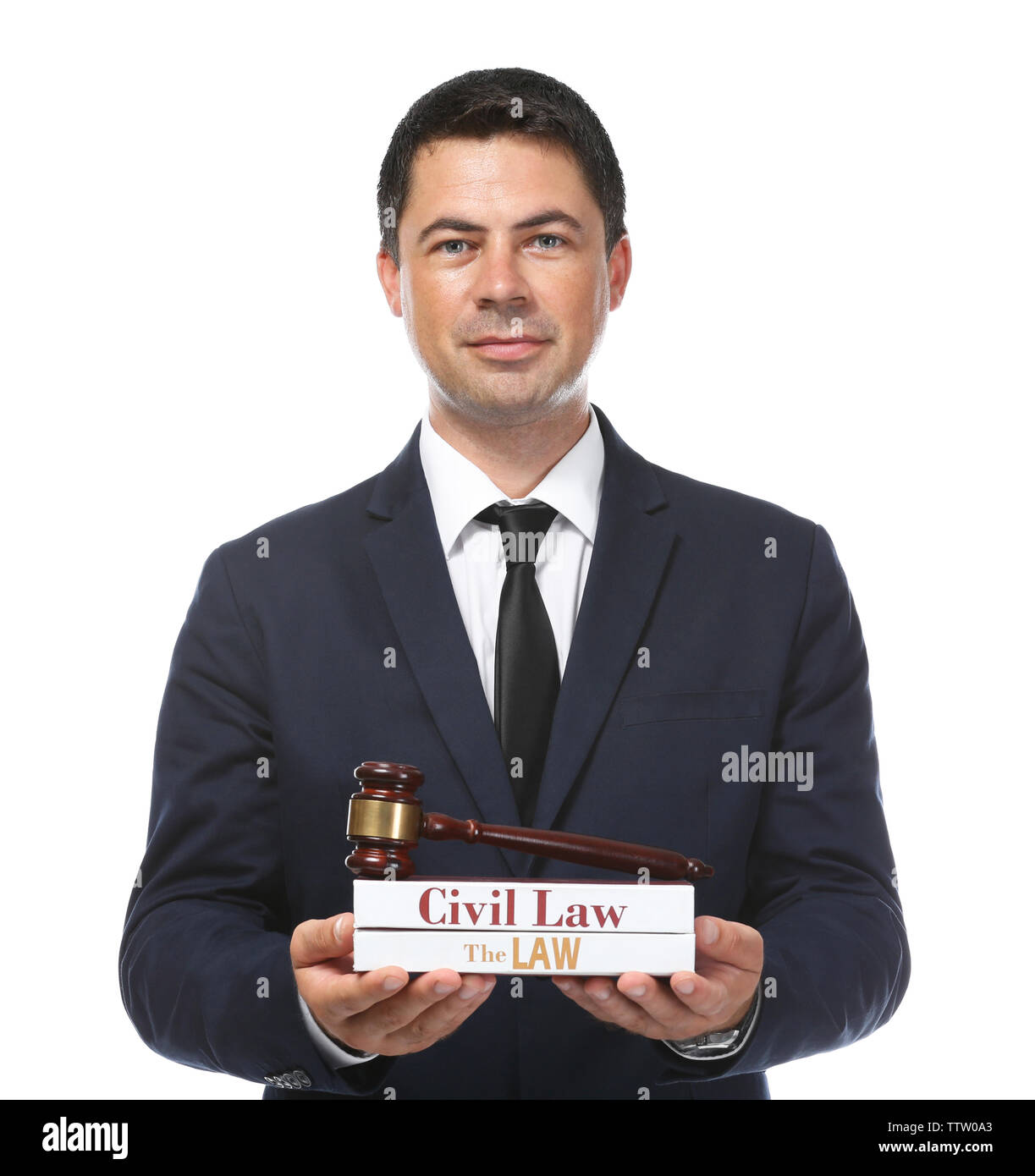 Man holding books and judge gavel on white background Stock Photo - Alamy