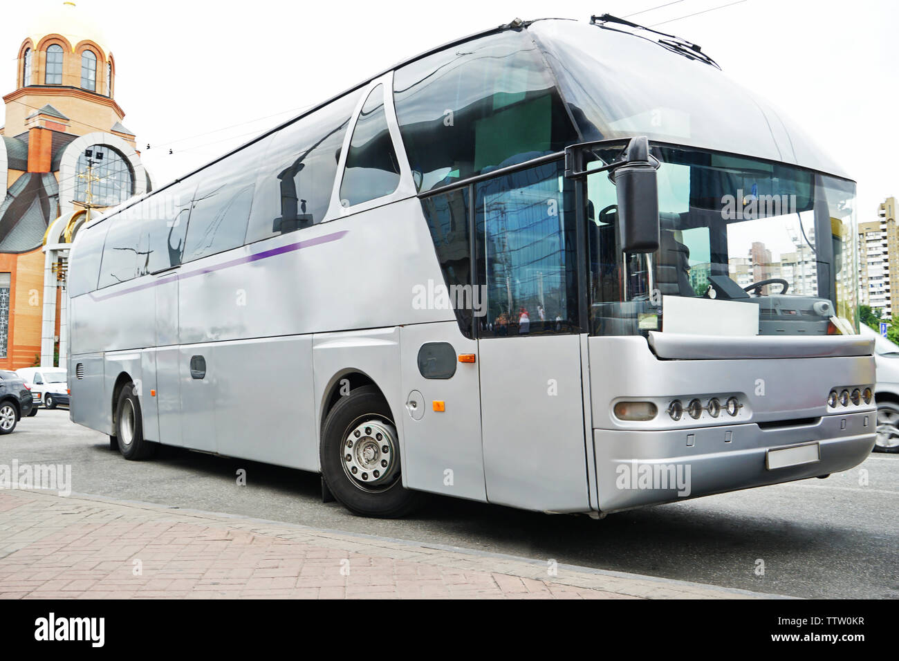 New tourist bus at station Stock Photo - Alamy
