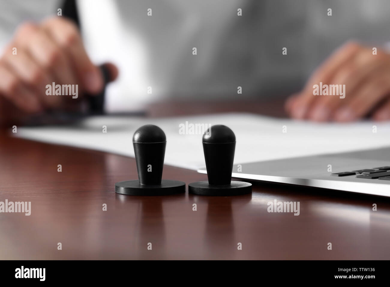 Two stamps on notary public table Stock Photo - Alamy