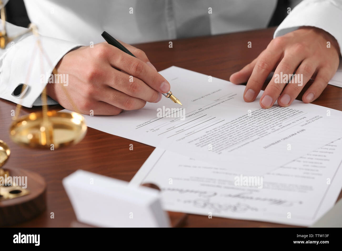 Notary public in office signing document Stock Photo - Alamy