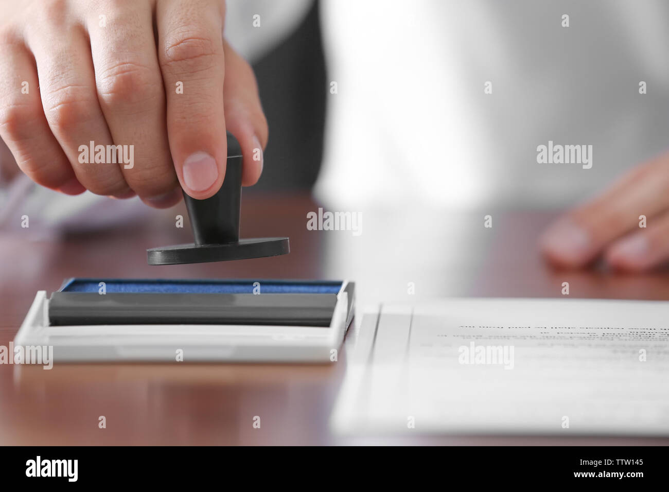 Pressing stamp hi-res stock photography and images - Alamy