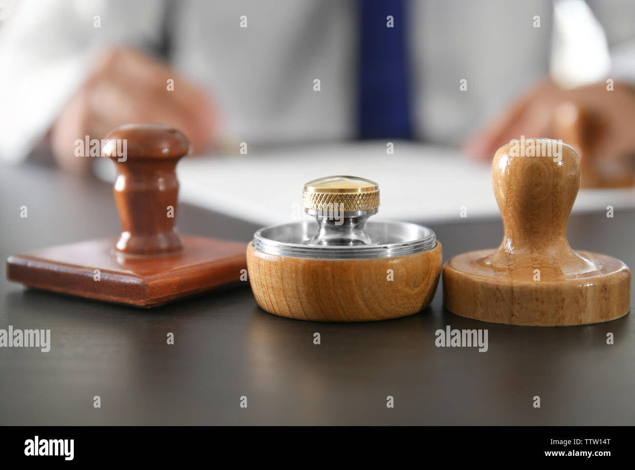 Different stamps on notary public table Stock Photo - Alamy