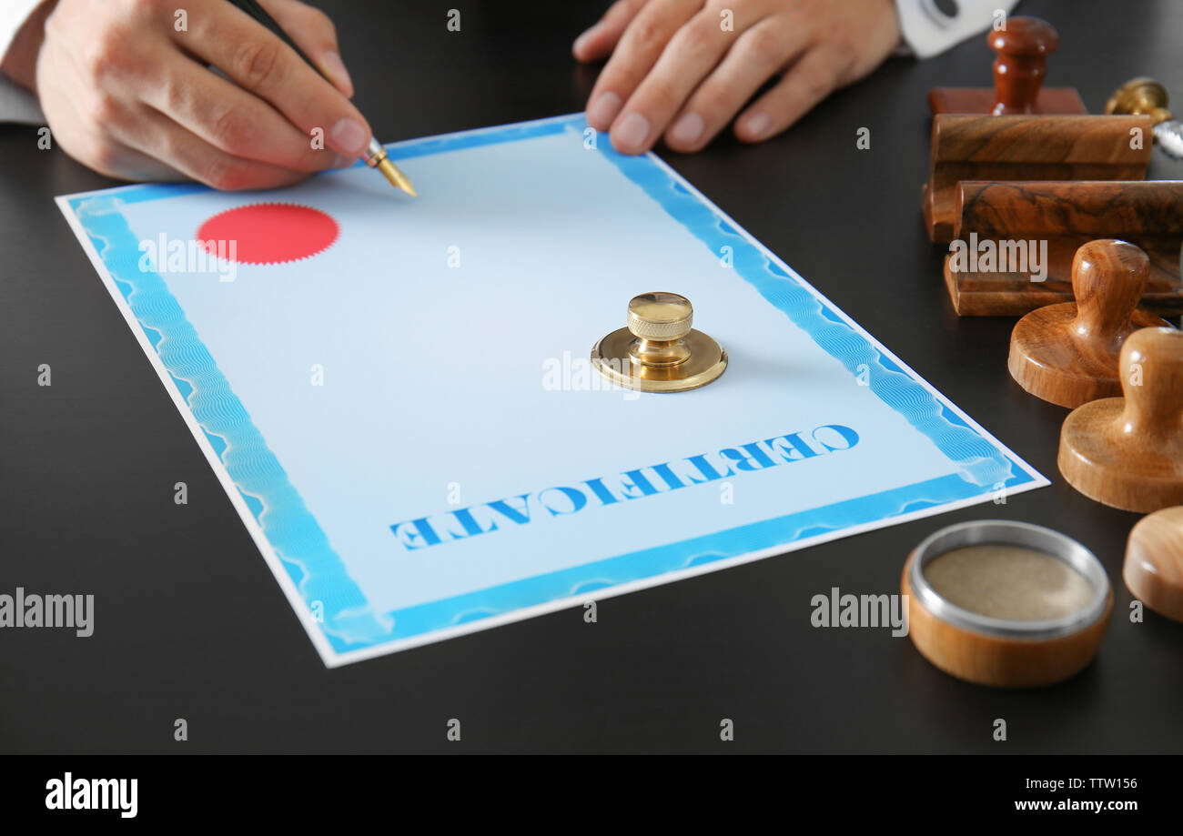 Signing certificate hi-res stock photography and images - Alamy